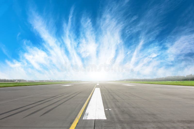 Empty Runway Strip with Markings with Beautiful Clouds on the Horizon ...