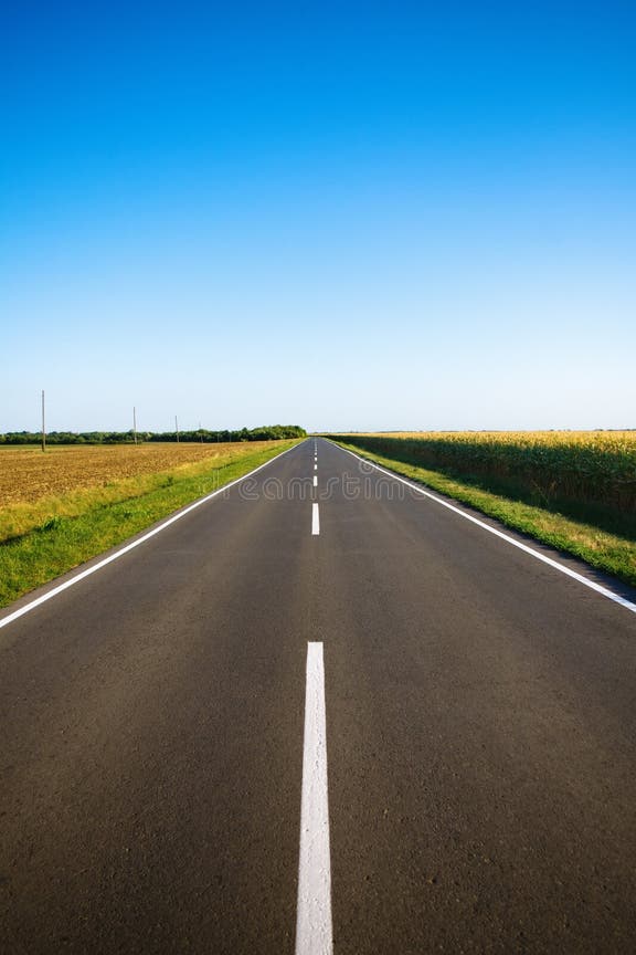 Empty rural road stock photo. Image of pole, highway - 26078428