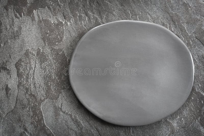 Empty Rustic Gray Oval Plate Over Slate Top View Stock Image - Image of ...