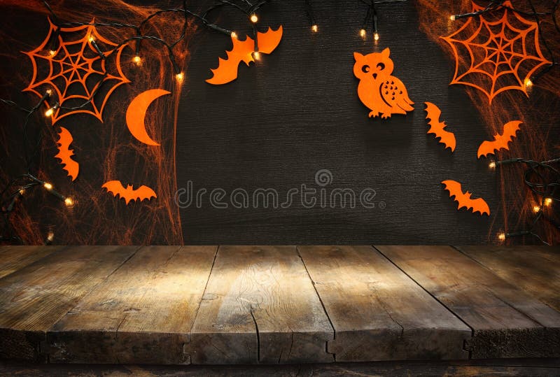 Empty Rustic Table in Front of Halloween Holiday Background. Ready for ...