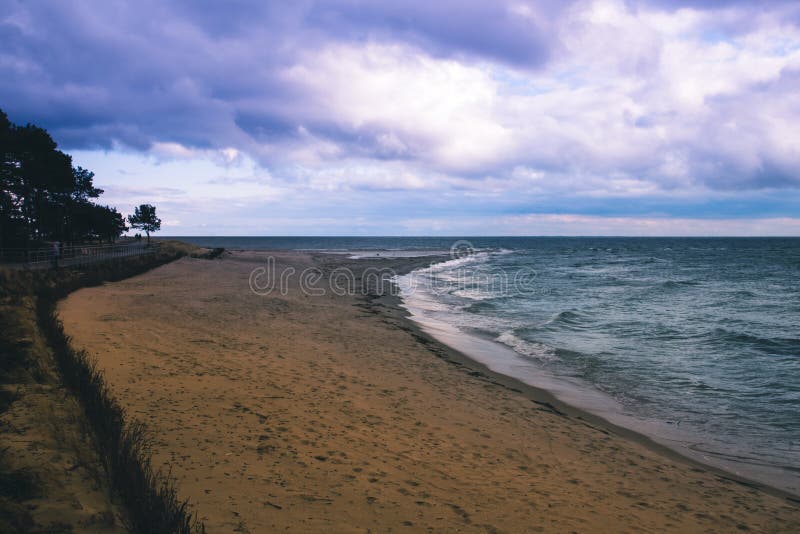 Empty Sandy Sea Beach at Dusk at Sunset, before the Storm Stock Photo ...