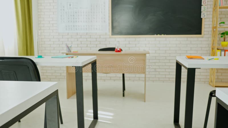 Empty School Elementary Classroom with Desks, Chairs and Chalkboard ...