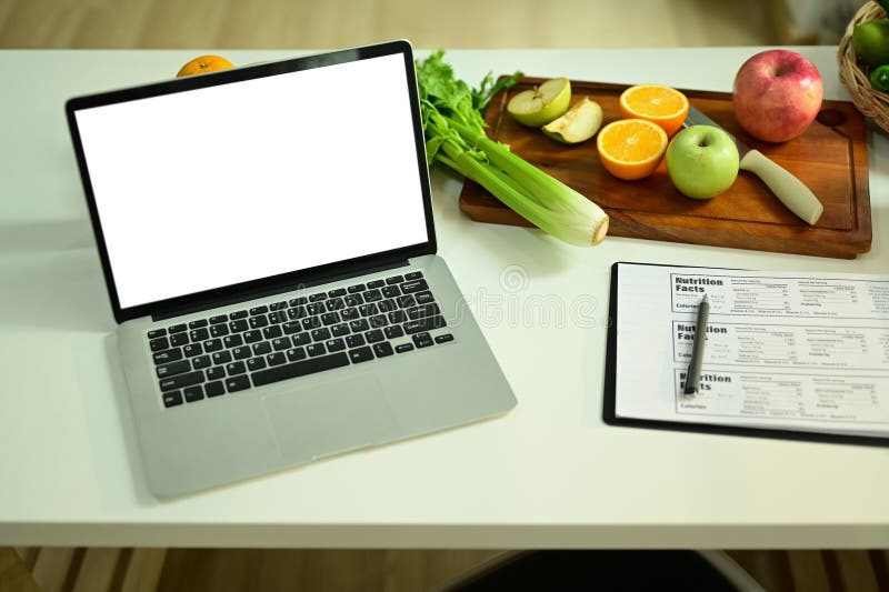 Empty Screen Laptop Computer with Fruit and Vegetable on Chopping Board ...