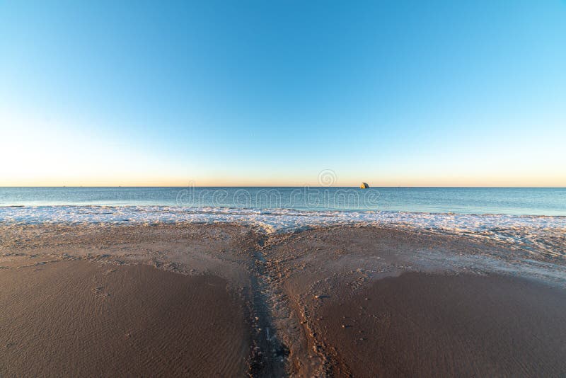 Empty Sea Beach with Ice Leftovers and No Snow Stock Photo - Image of ...