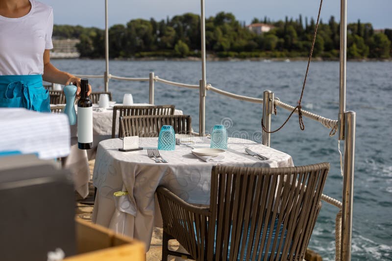 Empty Seaside Restaurant Table during Summer Stock Image - Image of ...