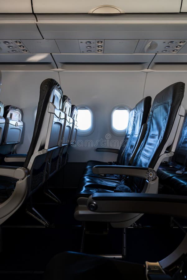 Inside the Airplane stock photo. Image of porthole, airplane - 327731818