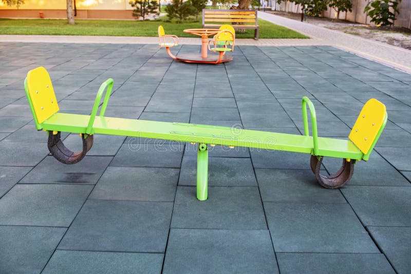 Seesaw at Public Wooden Castle Style Children Playground in Amer Stock ...