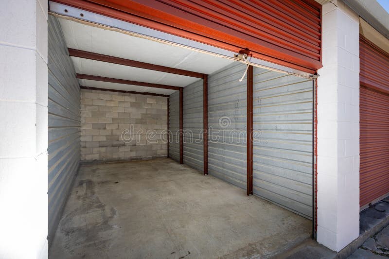 Empty self storage unit stock image. Image of walls - 128635949