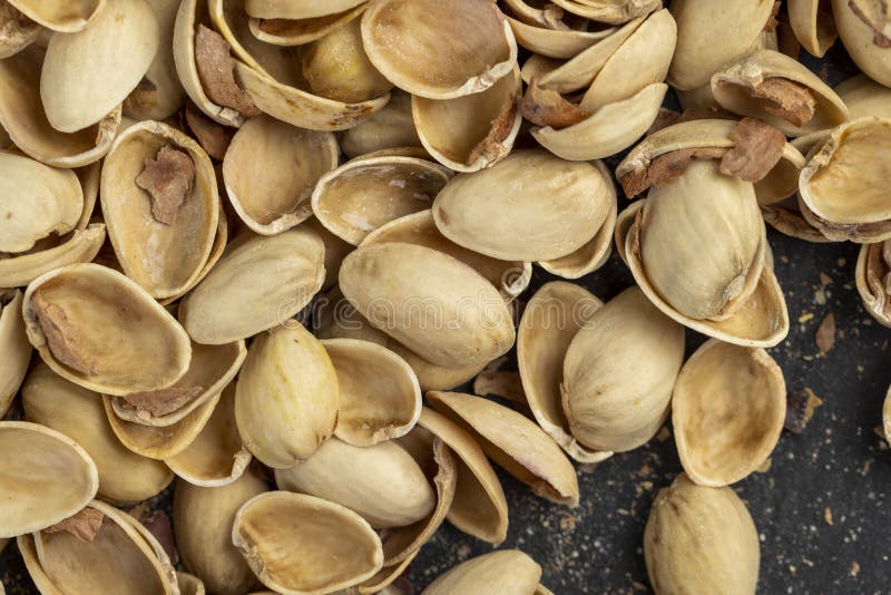 Empty Shells from Salted Pistachio Nuts on the Table Stock Photo ...