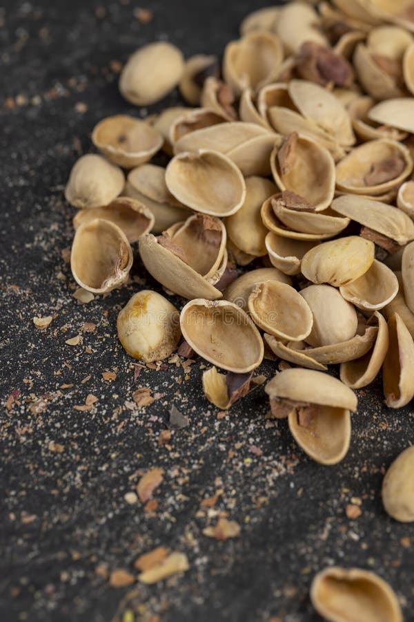Empty Shells from Salted Pistachio Nuts on the Table Stock Photo ...