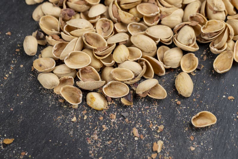Empty Shells from Salted Pistachio Nuts on the Table Stock Photo ...