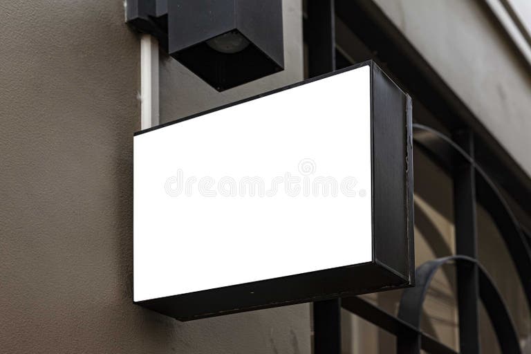 Shop Light Signs Hanging on the Wall in the Front of the Store Stock ...