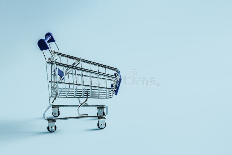 Empty Shopping Cart On Blue Background Stock Image - Image of shopping ...