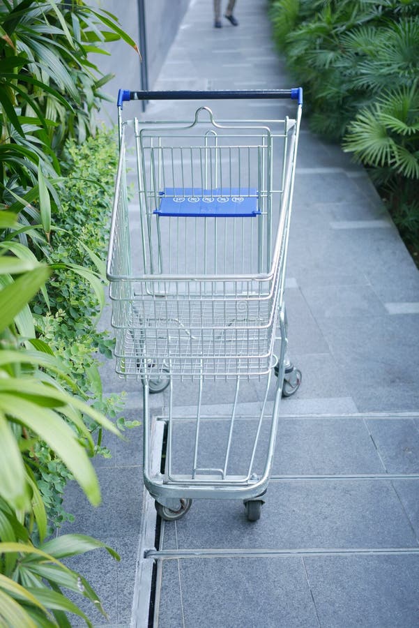 Empty Shopping Trolley Left Outside of a Market Stock Photo - Image of ...