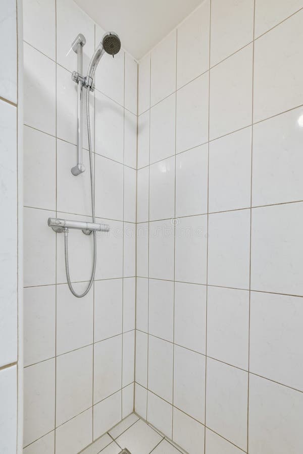 An Empty Shower in a White Tiled Bathroom Stock Photo - Image of tile ...