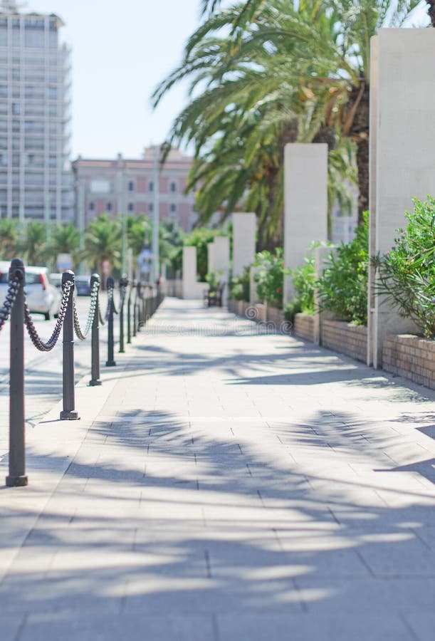 Empty sidewalk stock photo. Image of road, fence, stone - 37976230