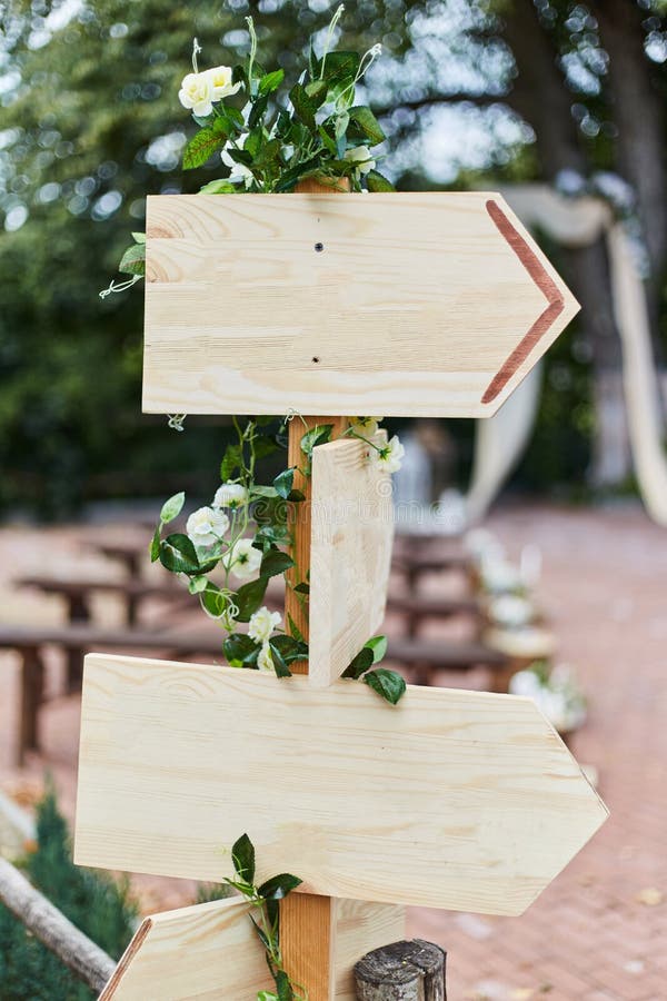 Empty Sign Pointers with a Space for Text. Wooden Pointers on a Wooden ...