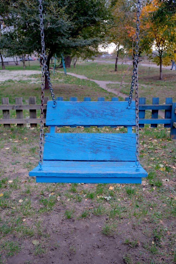 Empty Simple Children S Blue Swing Stock Photo - Image of amusement ...