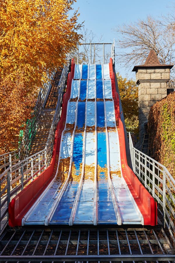 An Empty Slide in the Autumn Park Stock Photo - Image of riding ...