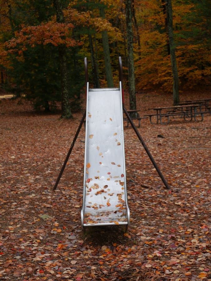 Empty Slide in Children`s Playground, Wet with Rain. Stock Image ...