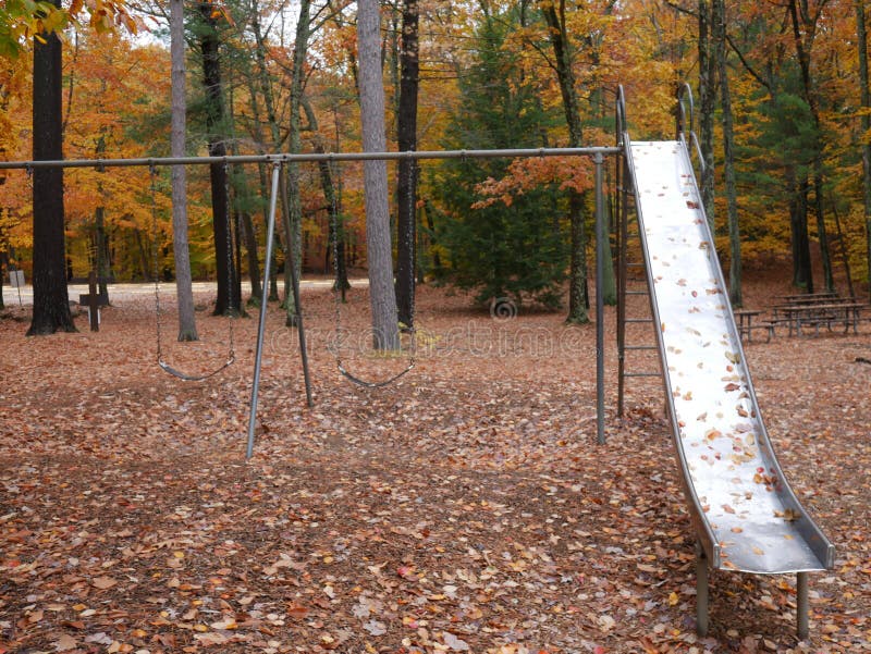 Empty Slide in Children`s Playground, Wet with Rain. Stock Image ...