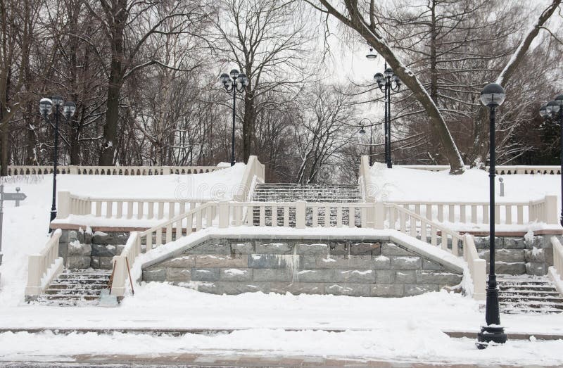 An Empty Snow-covered Vintage Staircase in the Park. Stock Photo ...