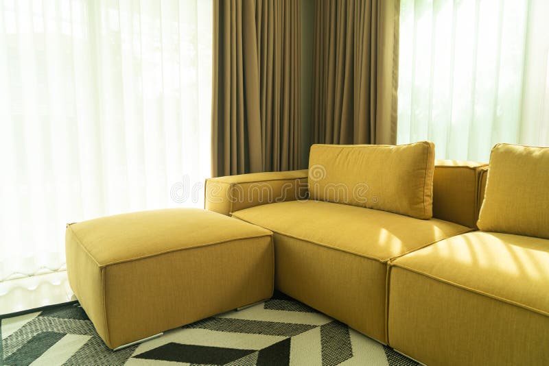 Empty sofa in living room stock photo. Image of hotel - 231968588