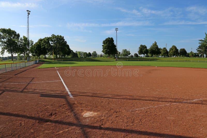 Softball Diamond stock image. Image of dusk, bases, chalk - 10028887
