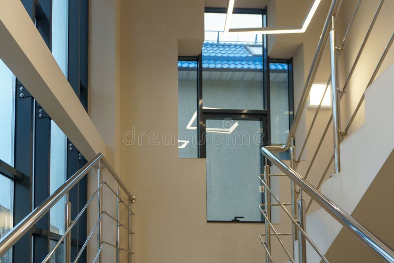 An Empty Space with Railings and Large Windows. the Modern Interior of ...