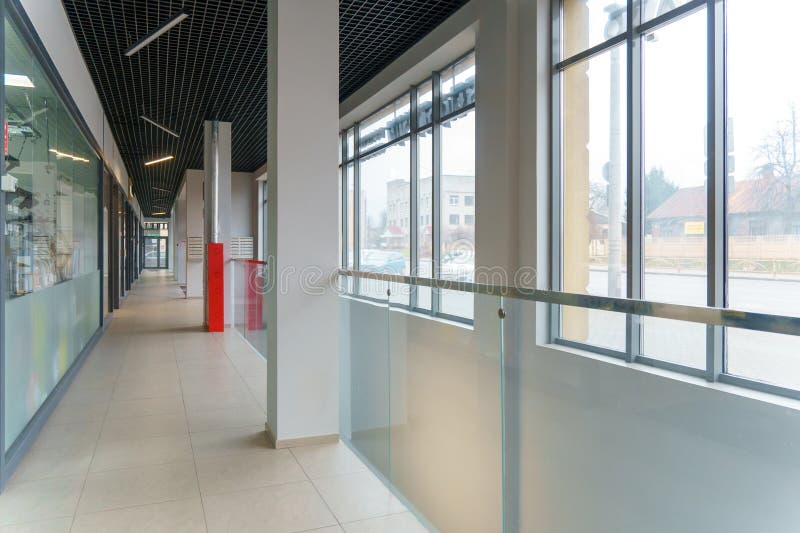 An Empty Space with Railings and Large Windows. the Modern Interior of ...