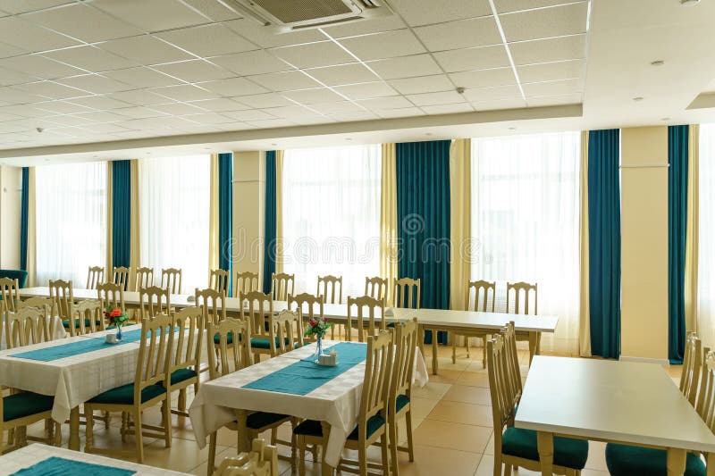 An Empty Spacious Banquet Hall with Tables and Chairs and Panoramic ...
