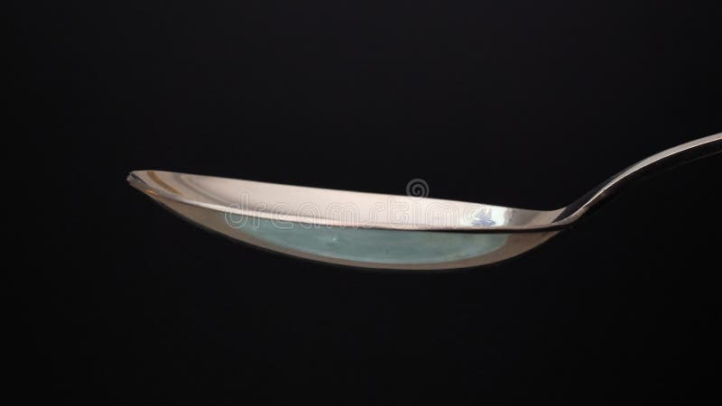 Empty Spoon on a Black Background Stock Photo - Image of food, teaspoon ...