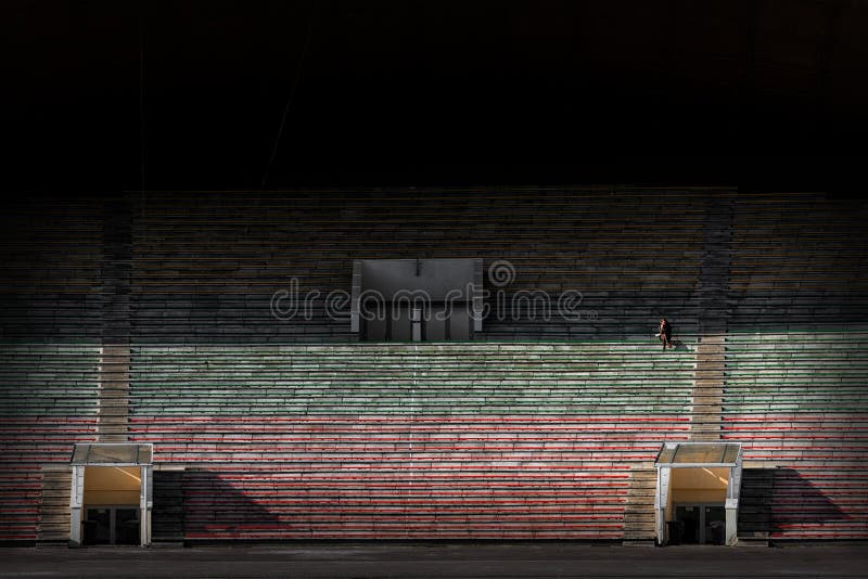 Empty Stadium in Lithuania, Vilnius. only One People Sitting in ...