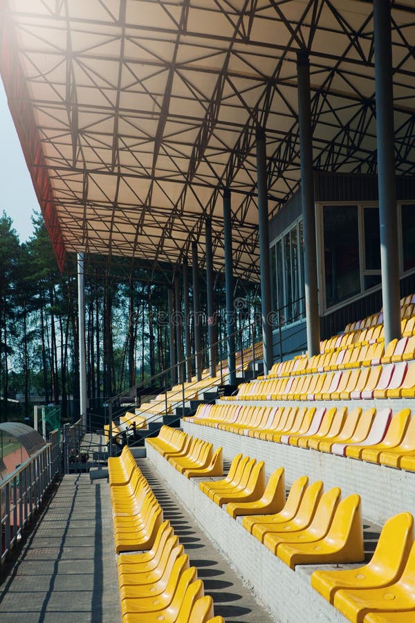 Empty Stadium. Rows of Yellow and Red Seats in Stadium Stock Photo ...