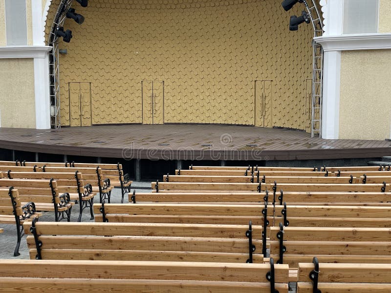 Empty Stage for a Performance on the Street Many Benches Stock Image ...