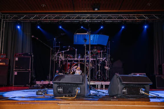 Empty Stage Set Up for a Live Rock Band Performance with Blue Lights ...