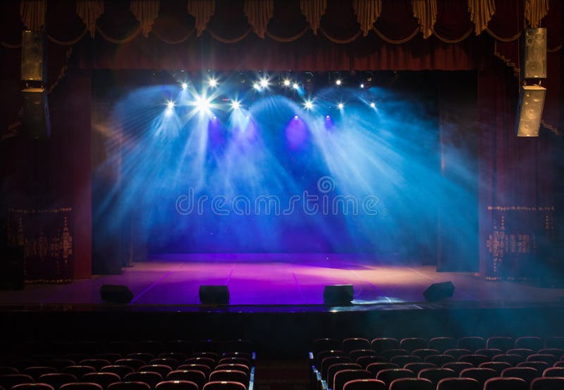 An Empty Stage of the Theater, Lit by Spotlights and Smoke Stock Image ...