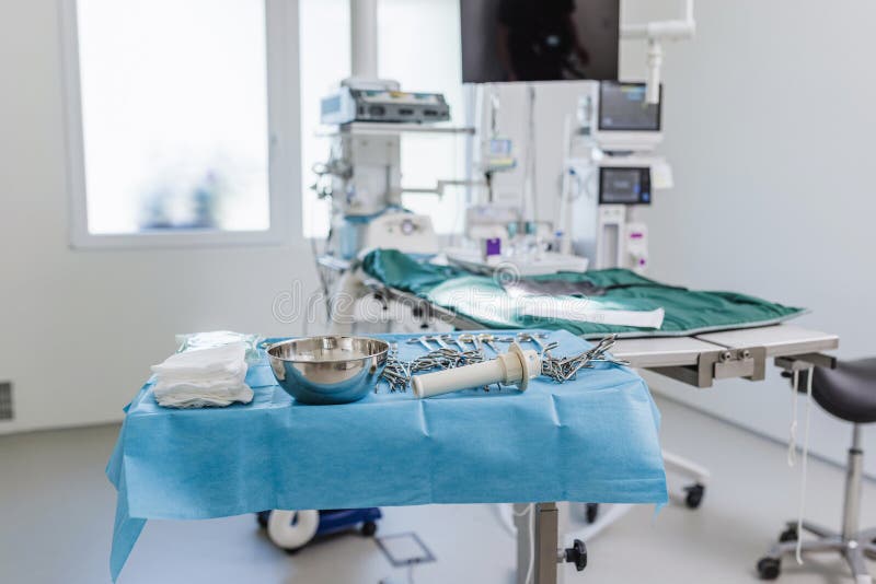 Sterile Operating Room with Surgical Table, Bright Overhead Lights ...