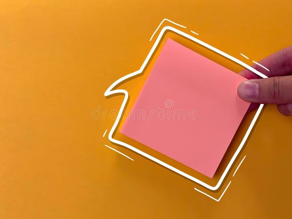 An Empty Sticker for Notes. the Hand Holds a Piece of Paper Stock Photo ...