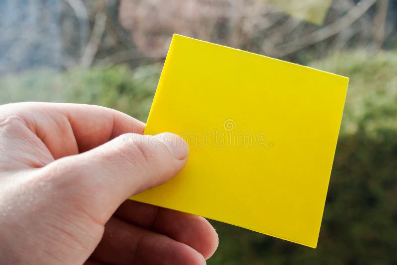 Empty Sticky Note in Human Fingers. Stock Photo - Image of finger ...