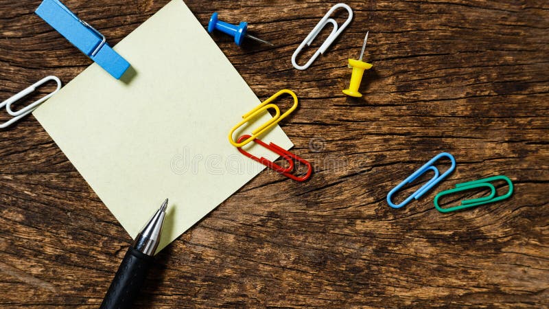 Empty Sticky Post Note Paper with Pen Pin and Paper Clip Sheet on ...
