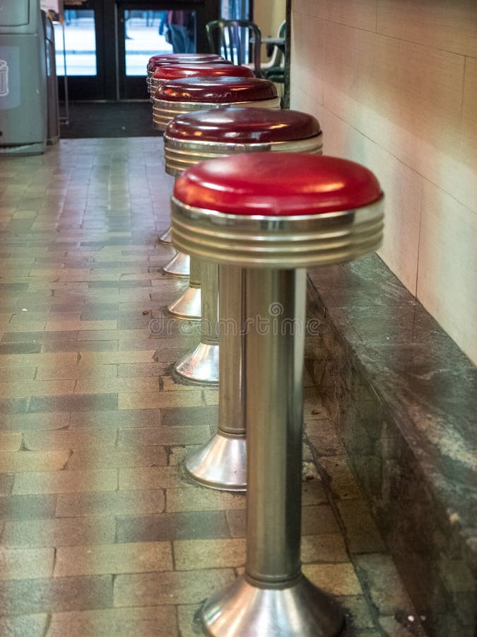 Empty Stools at a Counter in a City Market Stock Photo - Image of ...