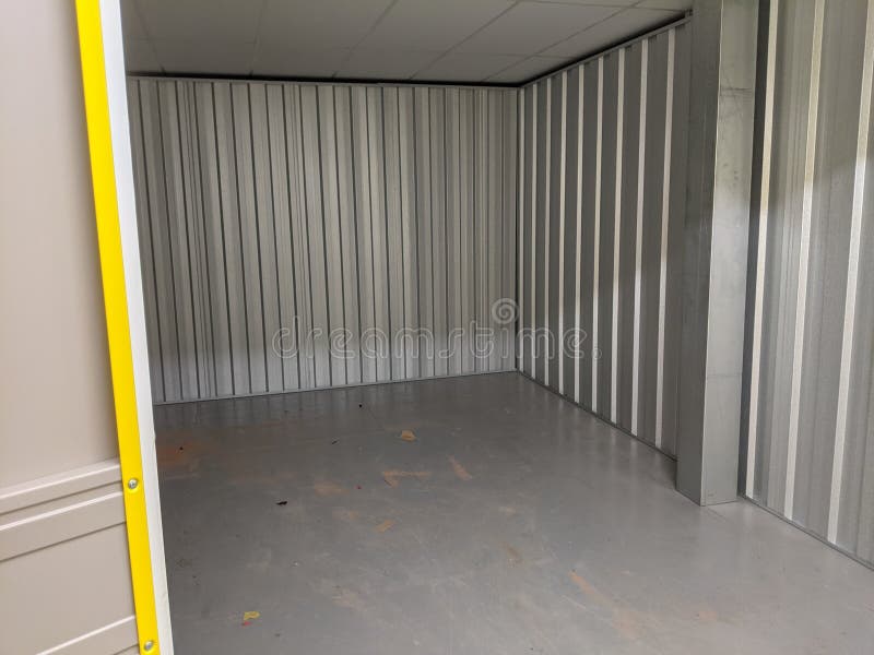 Empty self storage unit stock image. Image of walls - 128635949