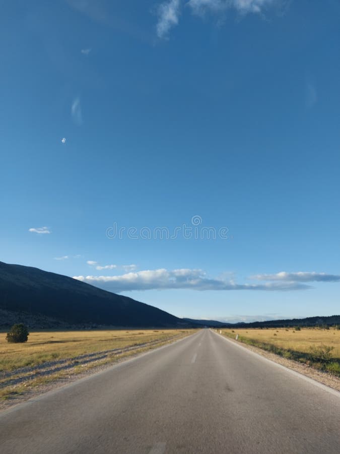 Empty straight road stock image. Image of wing, wall - 260656225