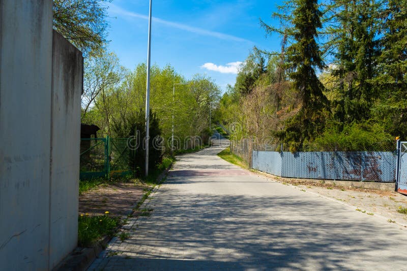 Empty Street of a Country Cottage Complex Stock Photo - Image of ...