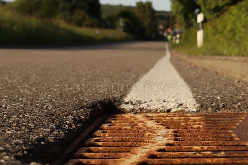 Empty Street with a Gully in the Front Stock Photo - Image of freedom ...