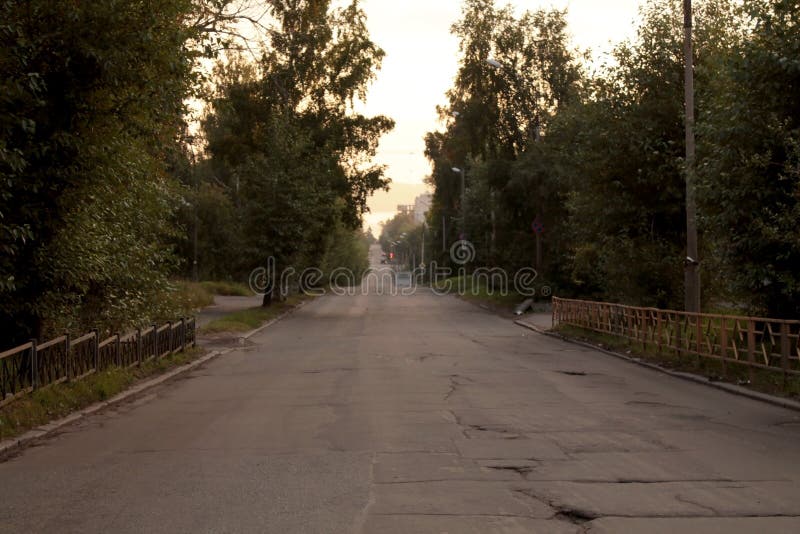 The Empty Street at Night with Rural Bad Asphalt Road Stock Photo ...