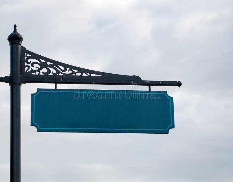 Empty Street Sign on Metal Post, Cloudy Sky in the Background. Stock ...