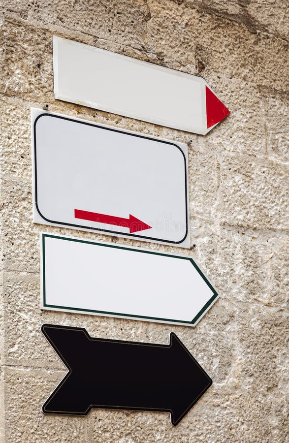 Signs on stone wall stock photo. Image of construction - 101626712