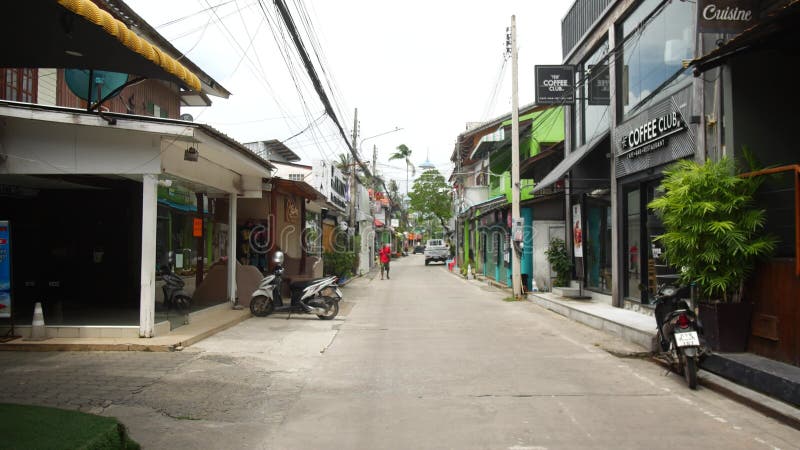 Empty Streets in a Town with Clouds Rolling Over the Mountains Stock ...